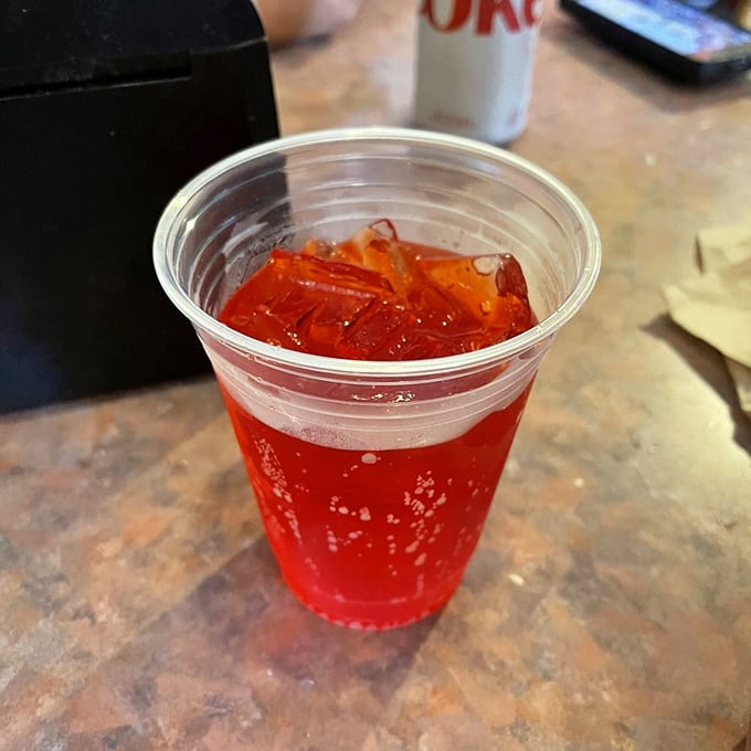 Even the drinks at Uncle Franky's come with personality. This red soda isn't just refreshing&mdash;it's like summer in a cup.