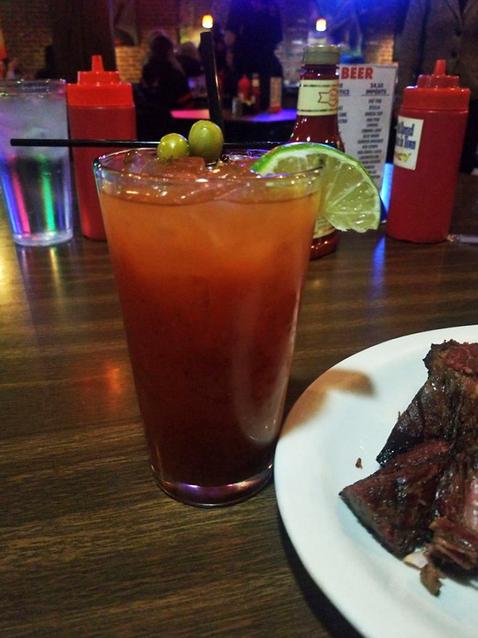 A proper barbecue cocktail garnished with lime and olives&mdash;because sometimes sweet tea just isn't going to cut it after a long week.