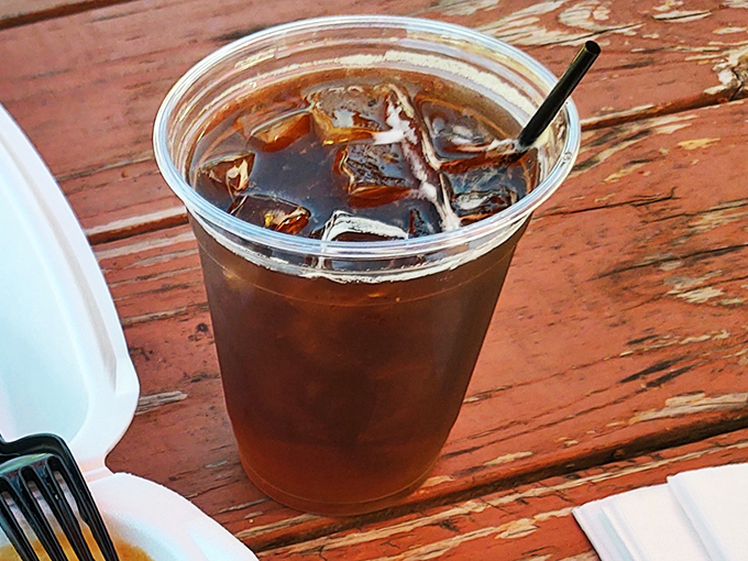 Even the sweet tea comes in a no-nonsense cup, cold enough to create condensation art on the weathered wooden table.