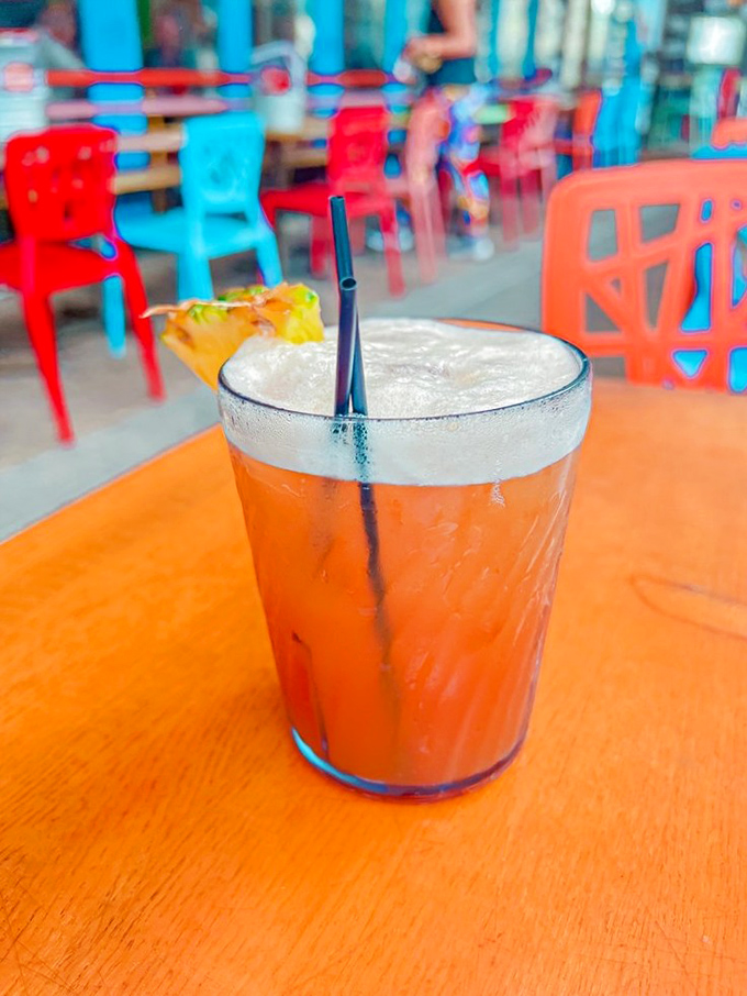 A tropical drink that practically whispers "vacation" with every sip. The perfect companion for pretending your office email doesn't exist.