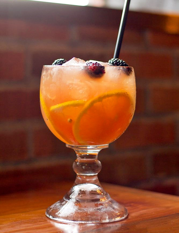 Cocktail or work of art? This citrus-forward beauty with fresh blackberries is what happens when bartenders dream in technicolor.