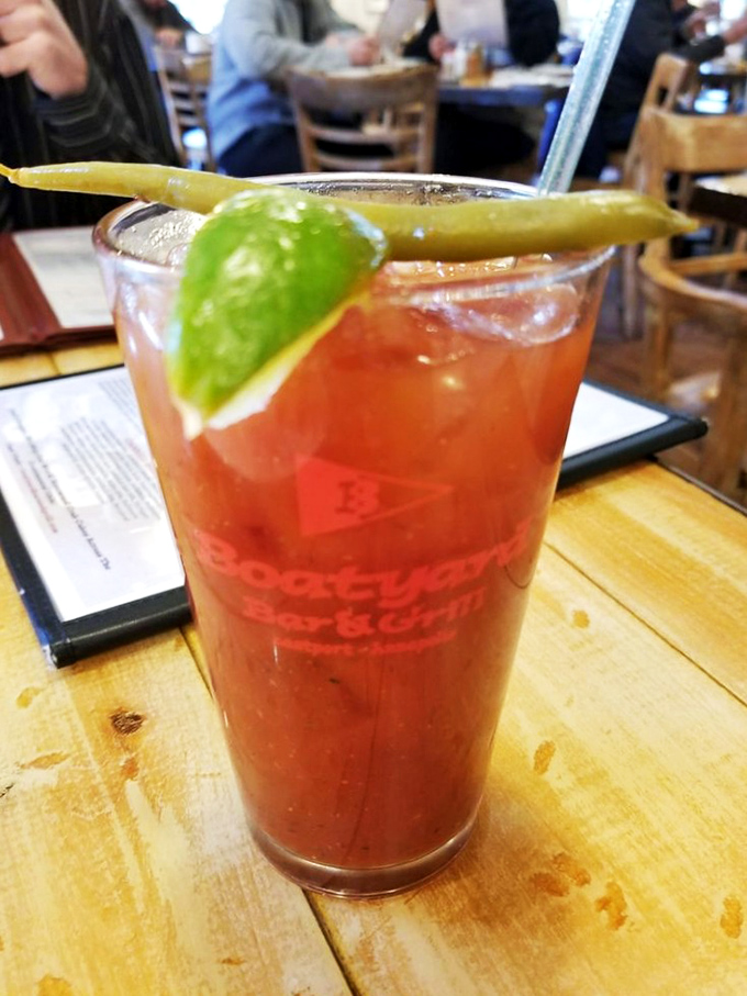 The Maryland Orange Crush: part cocktail, part state tradition, all refreshment. Like summer vacation in a glass, complete with lime lifeguard.