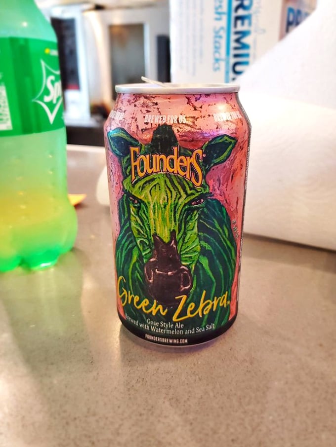 The honor system beer cooler's unofficial mascot: a Founders Green Zebra that's sweating almost as much as I am in Florida humidity.
