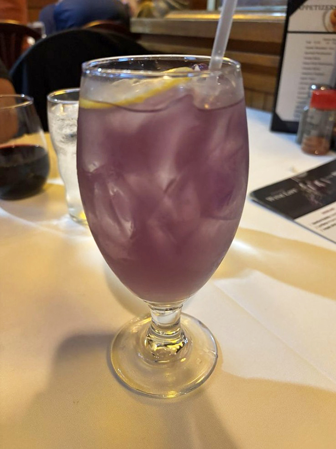 This vibrant purple cocktail isn't just a drink, it's a conversation starter that says, "Yes, I'm having dessert before, during, and after dinner."