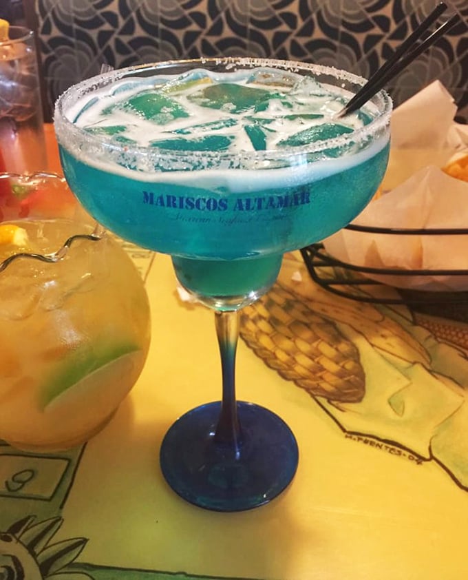 The blue margarita that launched a thousand selfies. One sip and you'll swear you can hear seagulls over the desert winds.