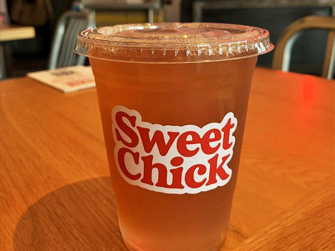 Sweet tea served in a cup that proudly displays the restaurant's name – because good branding and good beverages go hand in hand.