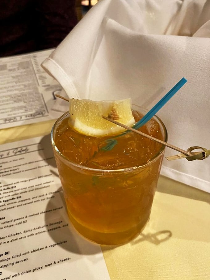 Sweet tea, the table wine of the South, garnished with lemon and served in a glass big enough to swim in.