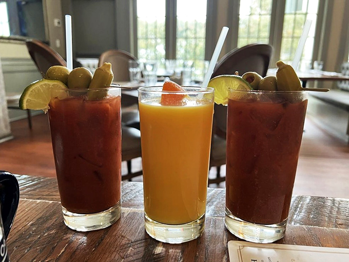 The holy trinity of brunch libations: two Bloody Marys standing guard around a mimosa. Breakfast of champions, indeed.