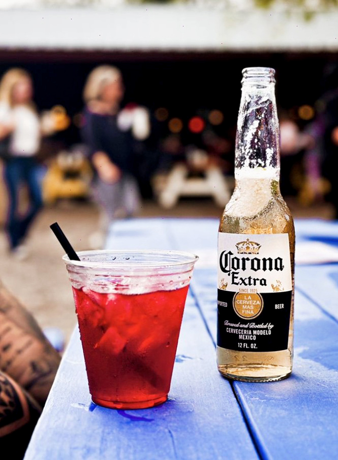 Cold beer and crimson drinks&mdash;because sometimes chicken needs liquid companionship. A vacation in glassware form.