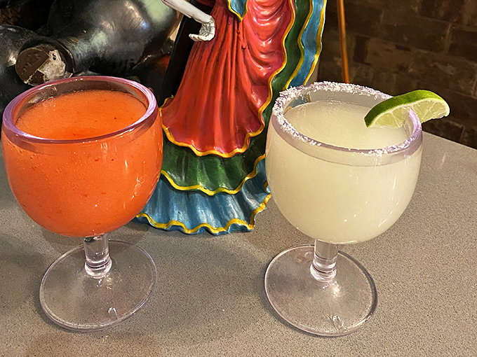 Margaritas in technicolor&mdash;one traditional lime, one strawberry. Both making a compelling argument against driving home.
