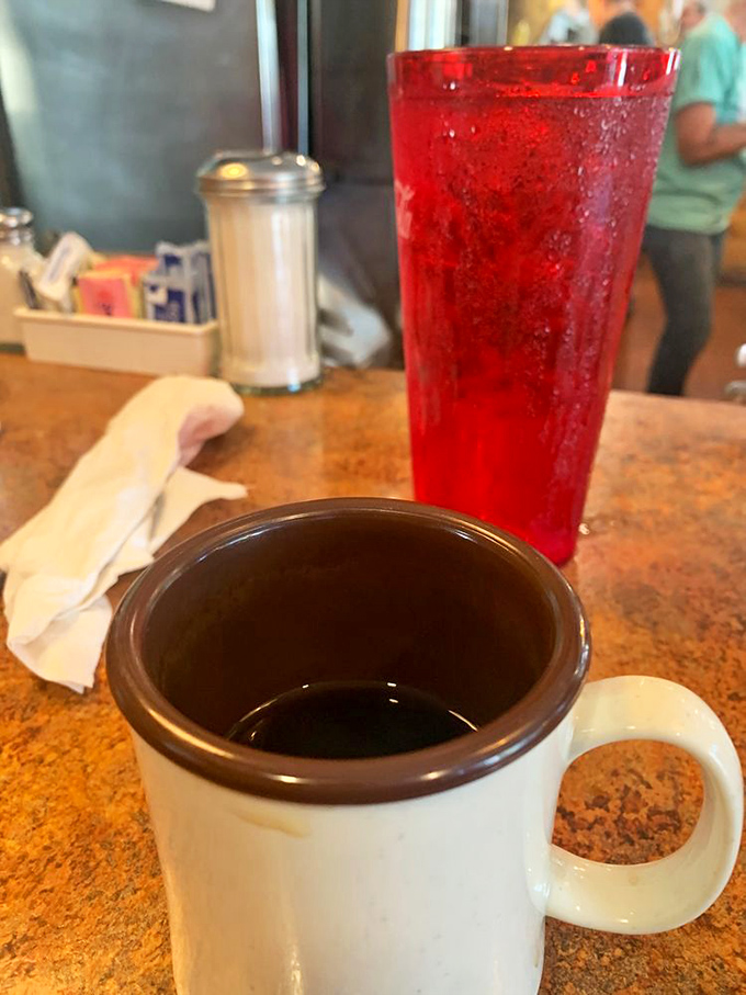 The diner coffee mug &ndash; humanity's most honest drinking vessel. Paired with that ruby-red punch, it's breakfast's version of wine and water.