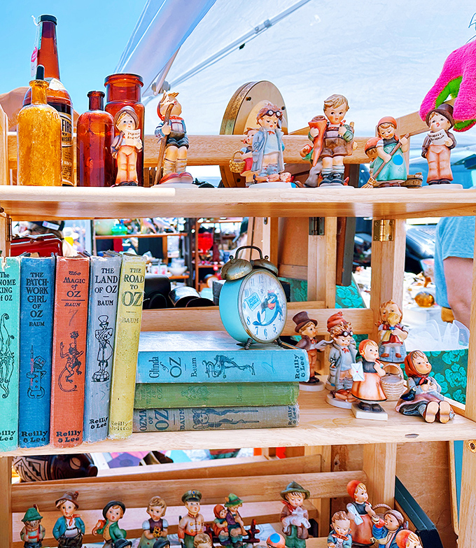 A miniature army of nostalgia stands at attention. Those Hummel-esque figurines watched over countless childhoods before landing here.