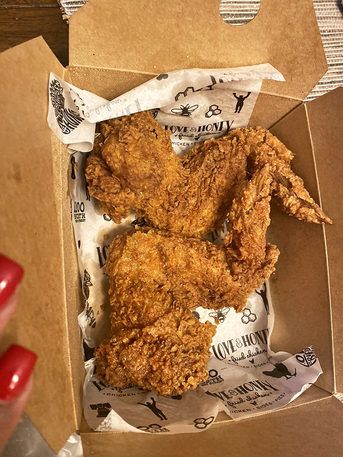 The Nashville hot chicken glows like edible embers. Your taste buds are about to experience their most delicious five-alarm fire.