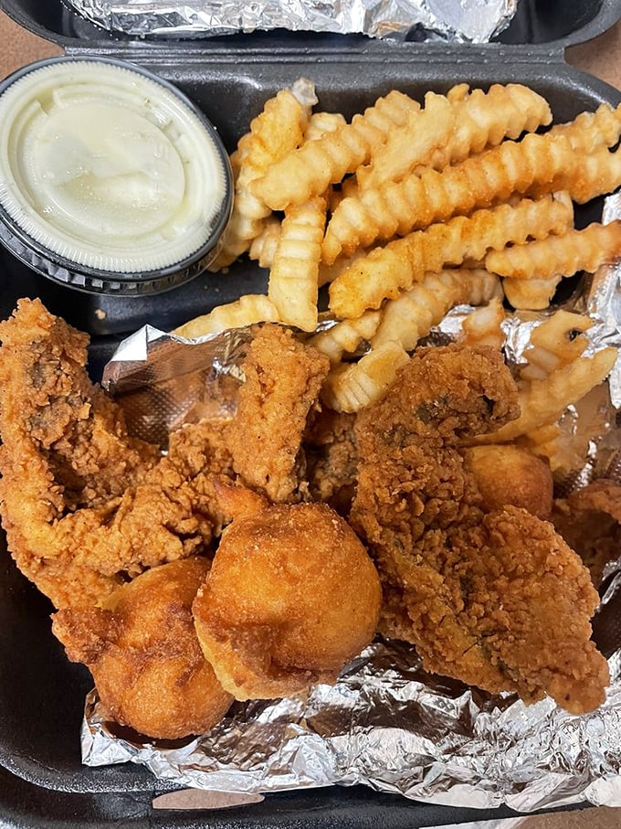 Fried whiting and fries presented with the confidence of food that knows it's about to change your day. Simplicity that speaks volumes.