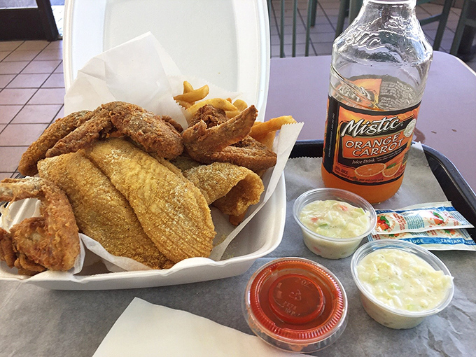 The classic combo plate&mdash;where crispy wings and catfish live together in perfect harmony, like the culinary odd couple you never knew you needed.