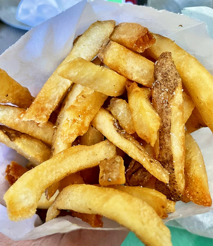 Fries so perfectly golden and crisp, they make you wonder why anyone bothers with cryptocurrency when potato currency tastes this good.