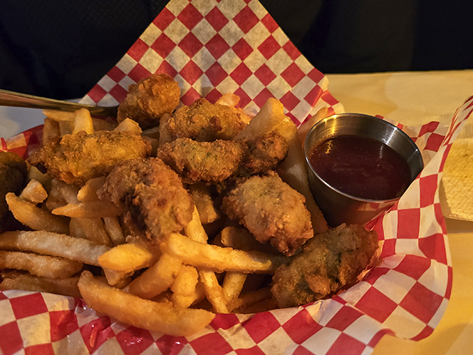 Hush puppies so perfectly golden they deserve their own trophy, while the fries play a supporting role worthy of a Best Friend Oscar.