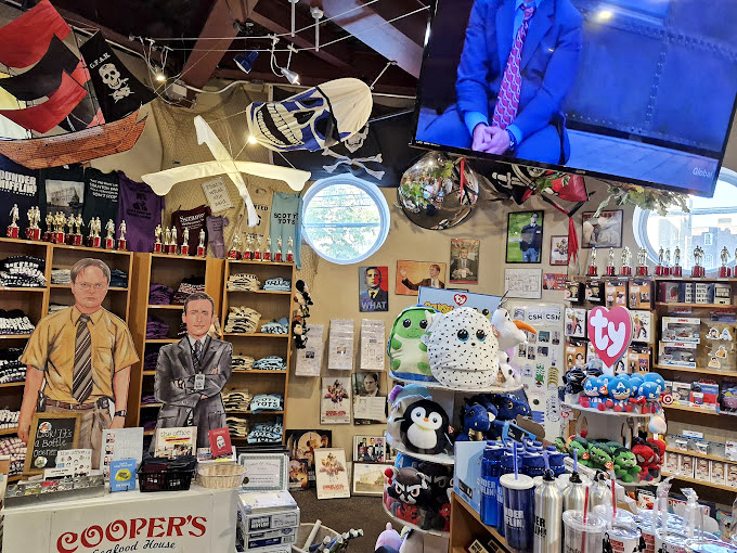 The gift shop isn't just merchandise—it's a treasure trove of pop culture and nautical whimsy that makes waiting for a table an adventure.