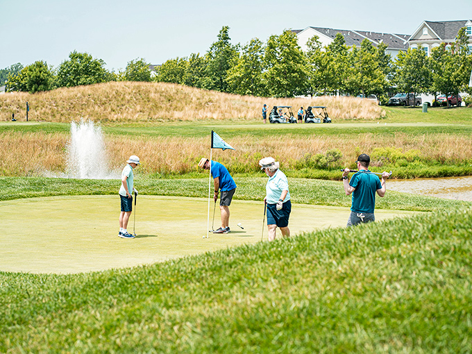 Golf enthusiasts find their happy place on Millsboro's manicured greens. Who needs stress when you've got sunshine and a good putt?