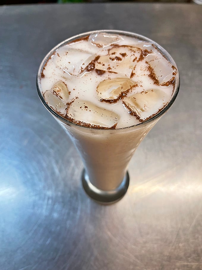 The horchata &ndash; cinnamon-kissed, ice-cold refreshment that cools the palate between bites of spicy goodness. Liquid comfort in a tall glass.