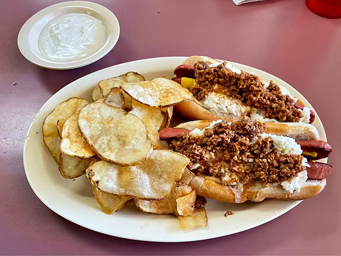 Chili dogs loaded with homestyle meat sauce&mdash;proof that sometimes the messiest foods create the cleanest plates and the happiest customers.