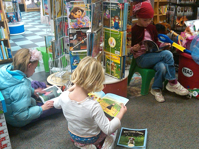 Little readers find their own corner of magic here, where colorful spines promise adventures requiring no batteries or Wi-Fi.