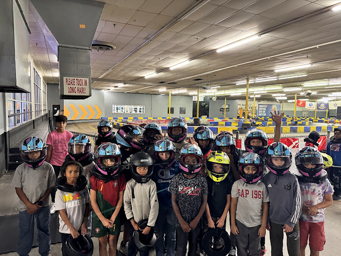 Future NASCAR stars getting their first taste of speed. That kid in the pink helmet? Remember the face when she's lifting the Indy 500 trophy.