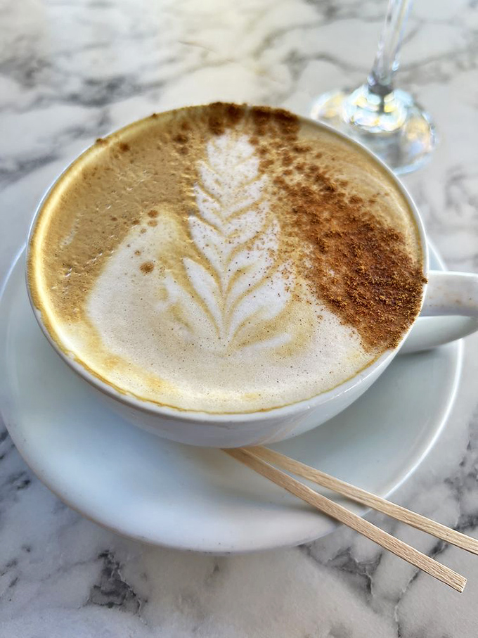 This latte isn't just coffee&mdash;it's liquid art with a leaf pattern so perfect you almost feel guilty disrupting it with your first sip. Almost.