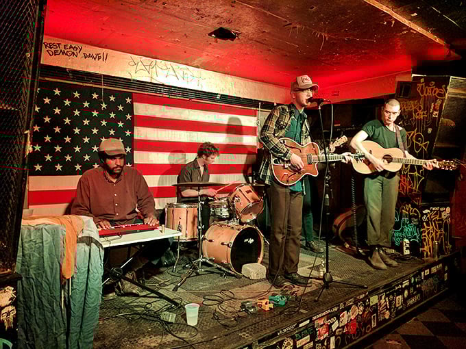 When bands play Gooski's back room, the American flag backdrop isn't patriotic d&eacute;cor&mdash;it's a reminder that dive bar music venues are America's truest cultural institutions.