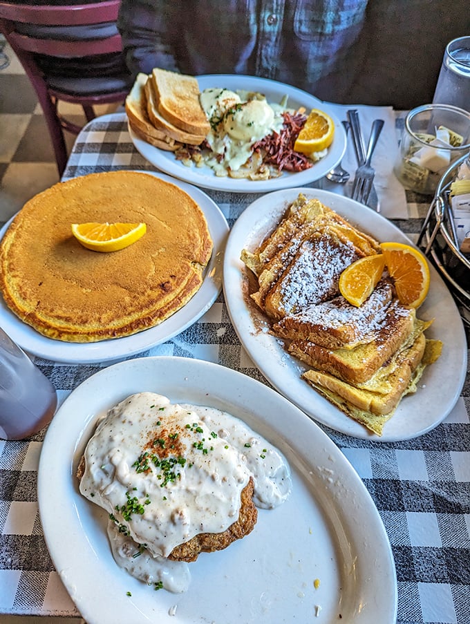 Breakfast theater in four acts: golden pancake the size of a frisbee, French toast powdered like a ski slope, gravy-smothered everything, and eggs Benedict stealing the show.