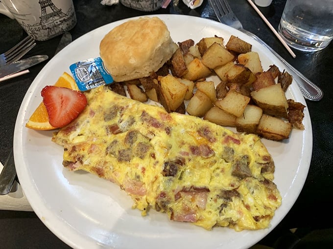 An omelet that answers the eternal question: "How much delicious protein can we fold into eggs?" The answer is gloriously excessive.