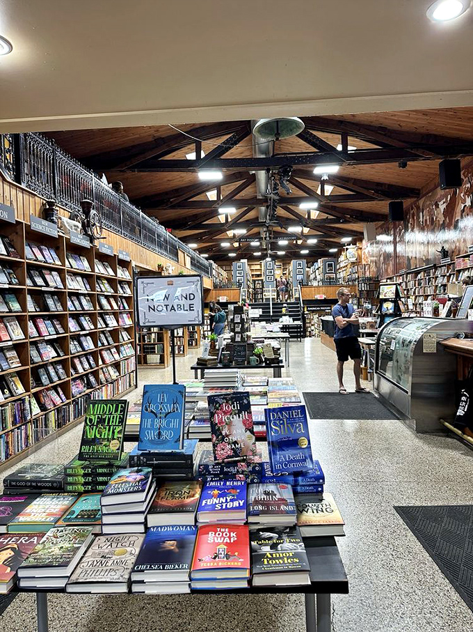 Literary hot-off-the-press heaven. The "New and Notable" section tempts you with fresh ink while the wooden beams above whisper of tradition.