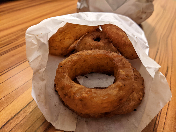 These onion rings aren't just side dishes&mdash;they're golden halos of crispy perfection that make you question why you ever ordered anything else.