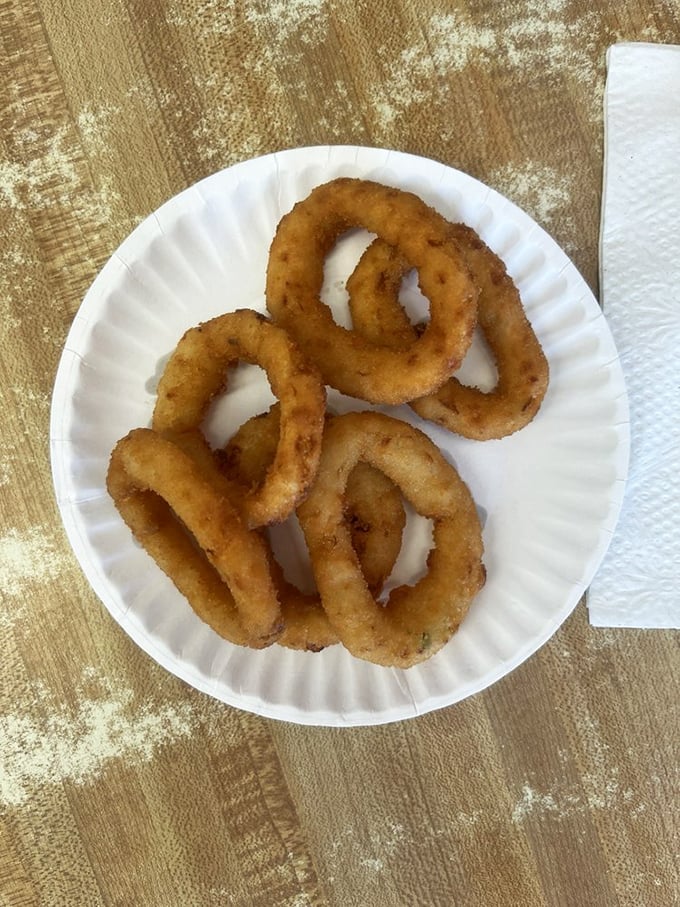 Golden-brown onion rings with that perfect crunch-to-softness ratio&mdash;the supporting actors that sometimes steal the whole show.