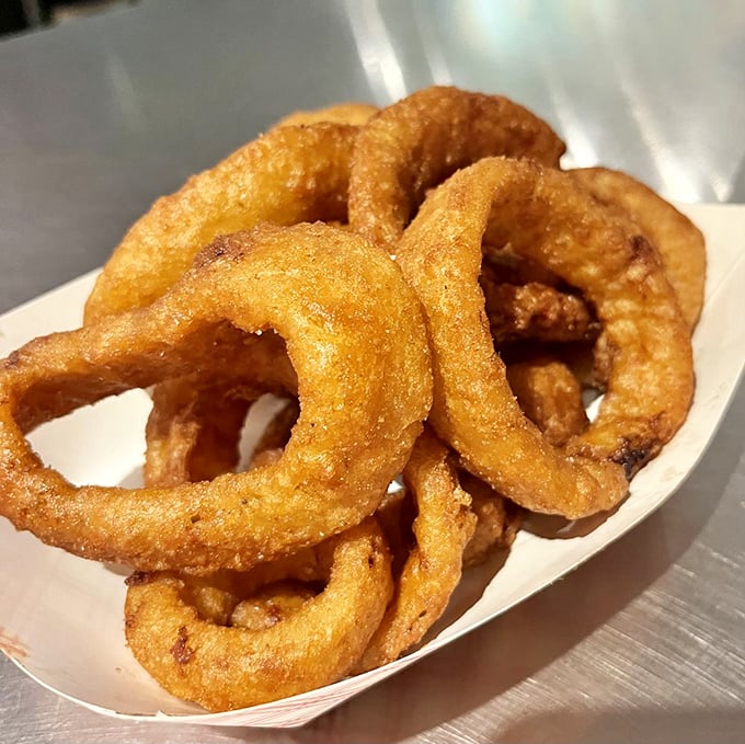 These onion rings aren't playing games&mdash;thick-cut, perfectly battered circles of joy that snap with satisfying crispness.