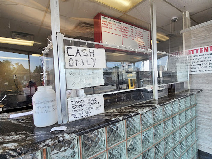 The no-nonsense "Cash Only" sign is like a time portal to when transactions were simpler and food was all that mattered.