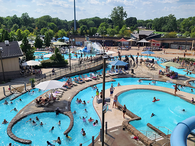 A bird's-eye view of aquatic real estate where every pool has waterfront property. The perfect symphony of splashing, laughter, and occasional teen drama.