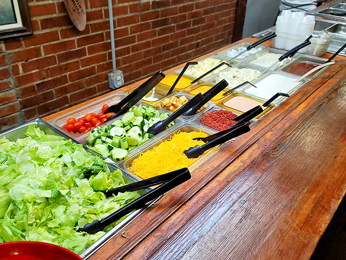 The salad bar offers a fresh counterpoint to hearty mains, though let's be honest&mdash;you're not here for the lettuce.