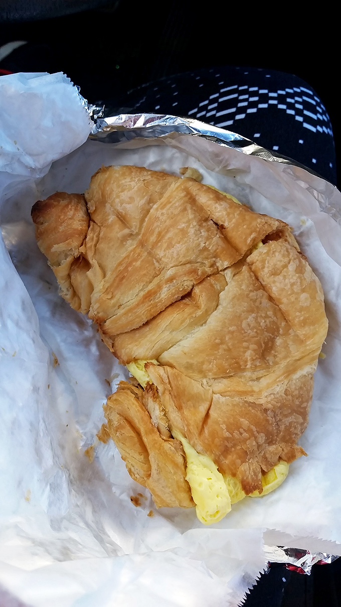 The breakfast sandwich on a croissant&mdash;where butter meets protein in a morning romance that puts rom-coms to shame.