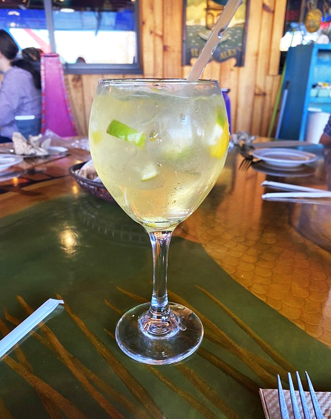 A refreshing cocktail with lime that says, "Yes, you're about to demolish two pounds of crab legs, but let's be civilized about it."