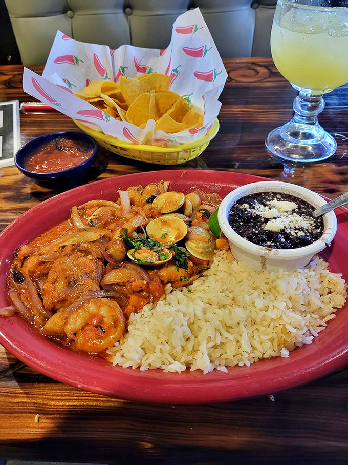 The ocean meets Missouri in this seafood spectacular. Shrimp and clams mingle with vegetables in what can only be described as a fiesta for your palate.
