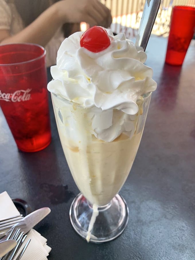 This isn't just a milkshake&mdash;it's a tower of vanilla bliss that requires both a straw and a spoon, and possibly a nap afterward.