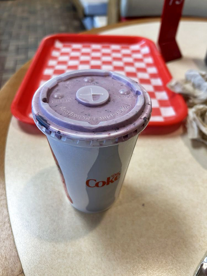 That classic paper Coke cup brings back childhood memories, when soda tasted better because you earned it playing outside.