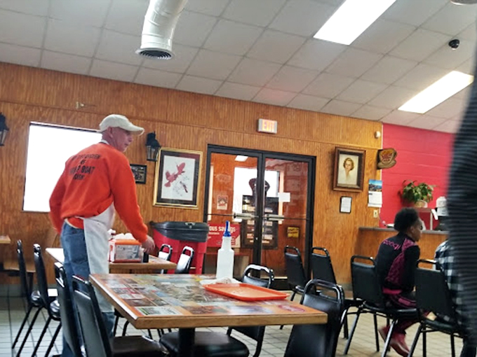 Where dining rooms become community spaces. The gentleman in orange knows exactly what makes this place special&mdash;the people and the food.