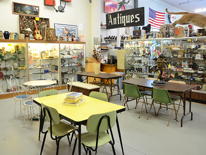 Mid-century cafeteria tables and chairs that once witnessed countless school lunches now await a second life in someone's retro kitchen.