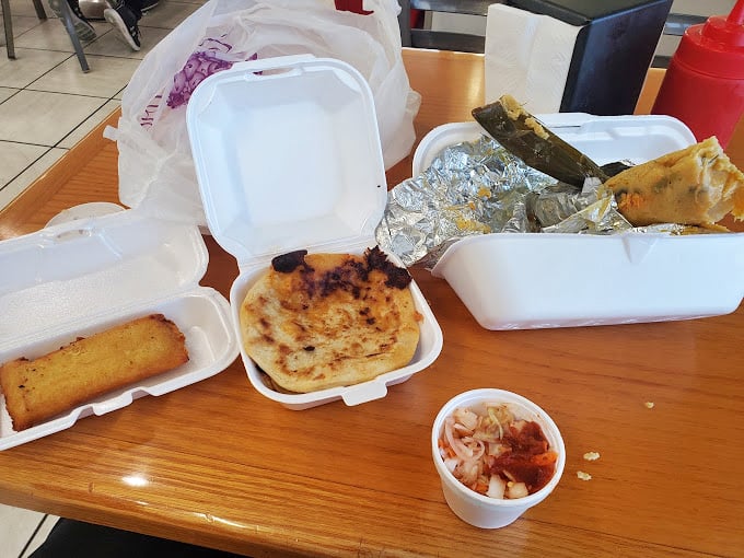 A humble feast fit for royalty: tamales, pupusas, and sides that make you question why you ever settled for drive-thru tacos.