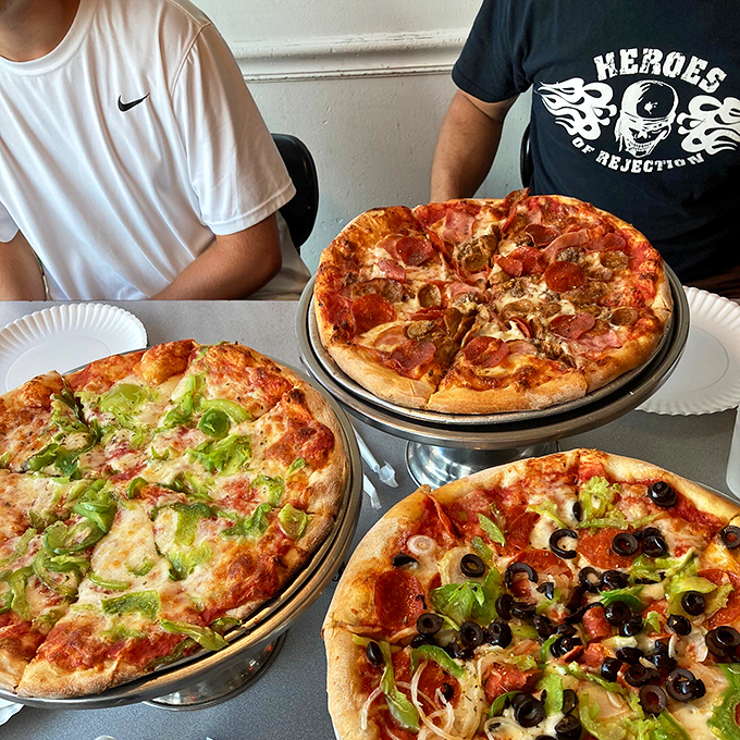 Three distinct personalities sharing one table—like a pizza version of The Breakfast Club, each with its own delicious story to tell.