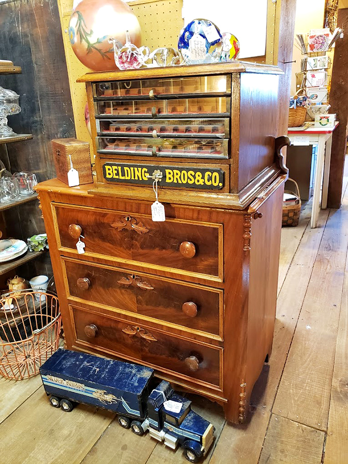 The Belding Bros. thread cabinet&mdash;functional furniture elevated to art. When sewing supplies deserved their own elegant home and drawers were built to last generations.