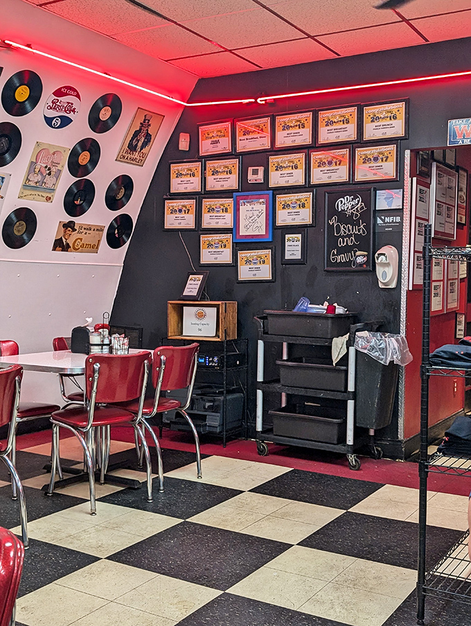 The wall of fame showcases awards and vinyl records&mdash;visual proof that good taste extends beyond just the kitchen at Charlie Parker's.