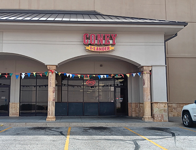 Festive bunting and classic signage announce Coney I-Lander's presence like a permanent hot dog celebration in the heart of Tulsa.
